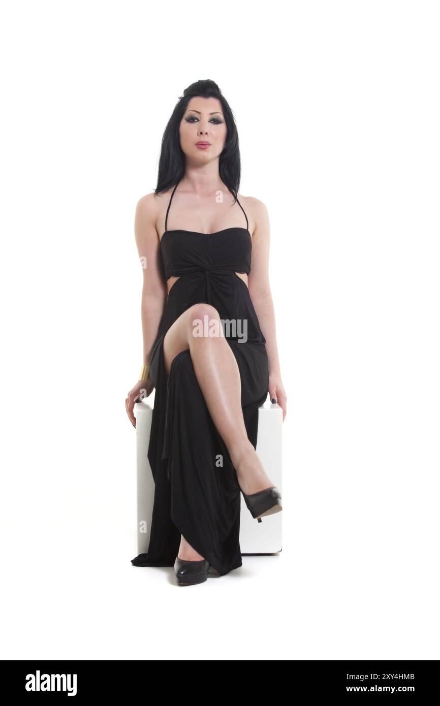 Sitting woman in black Cut Out Stock Images & Pictures - Alamy