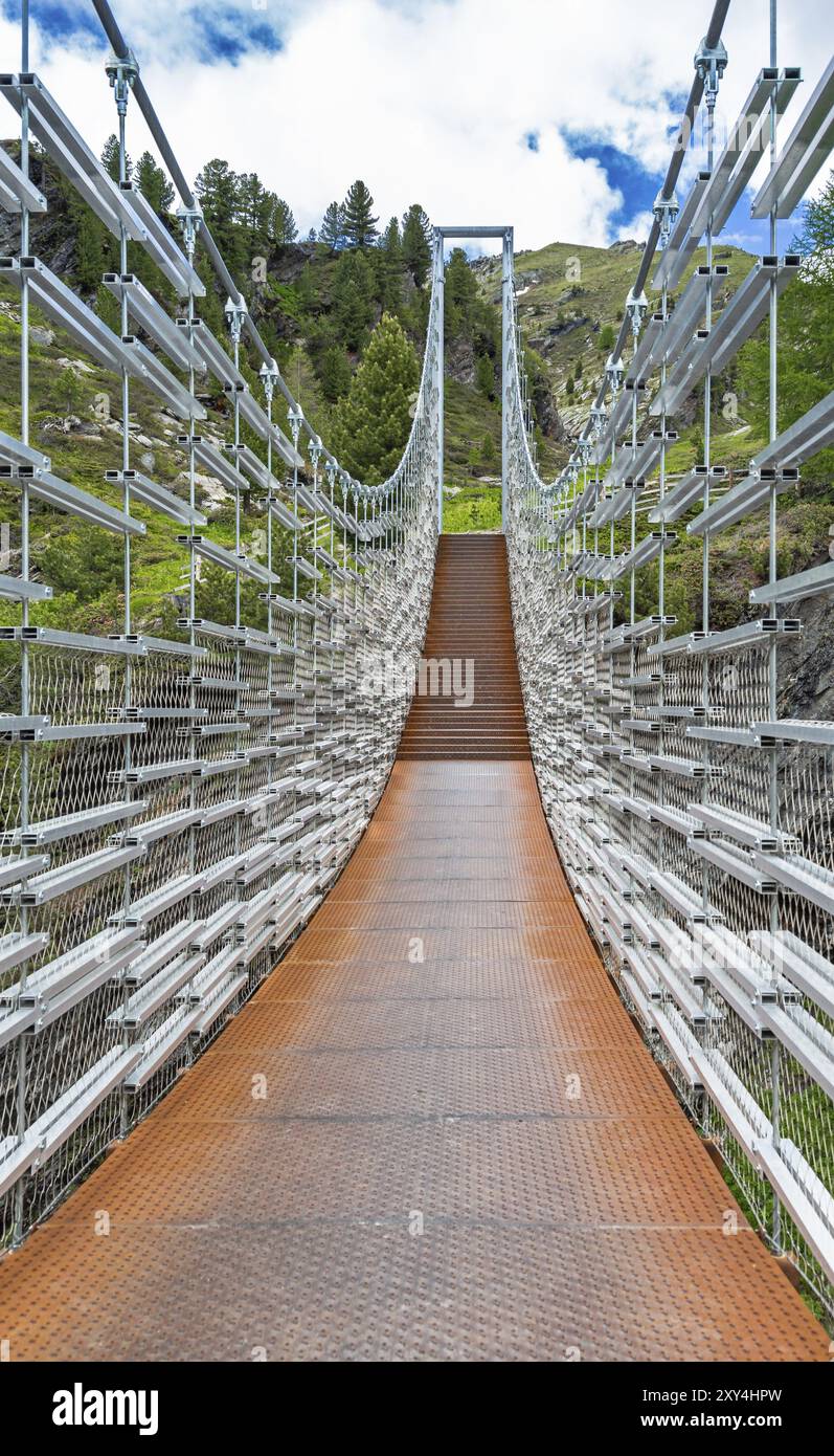 Suspension bridge over the Plima gorge in Val Martello, South Tyrol ...