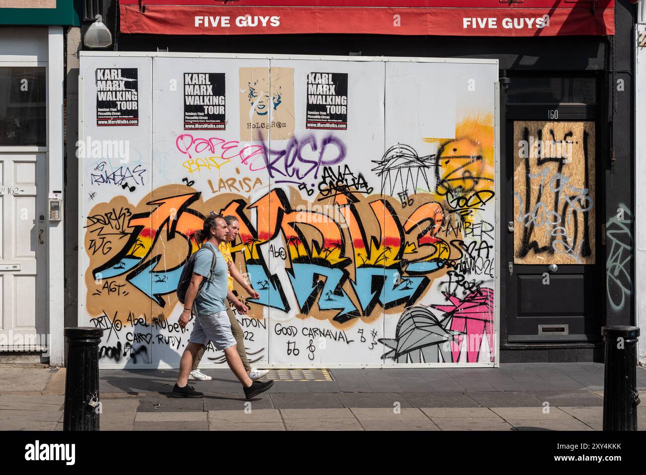 Five Guys restaurant boarded up for protection during the Notting Hill ...