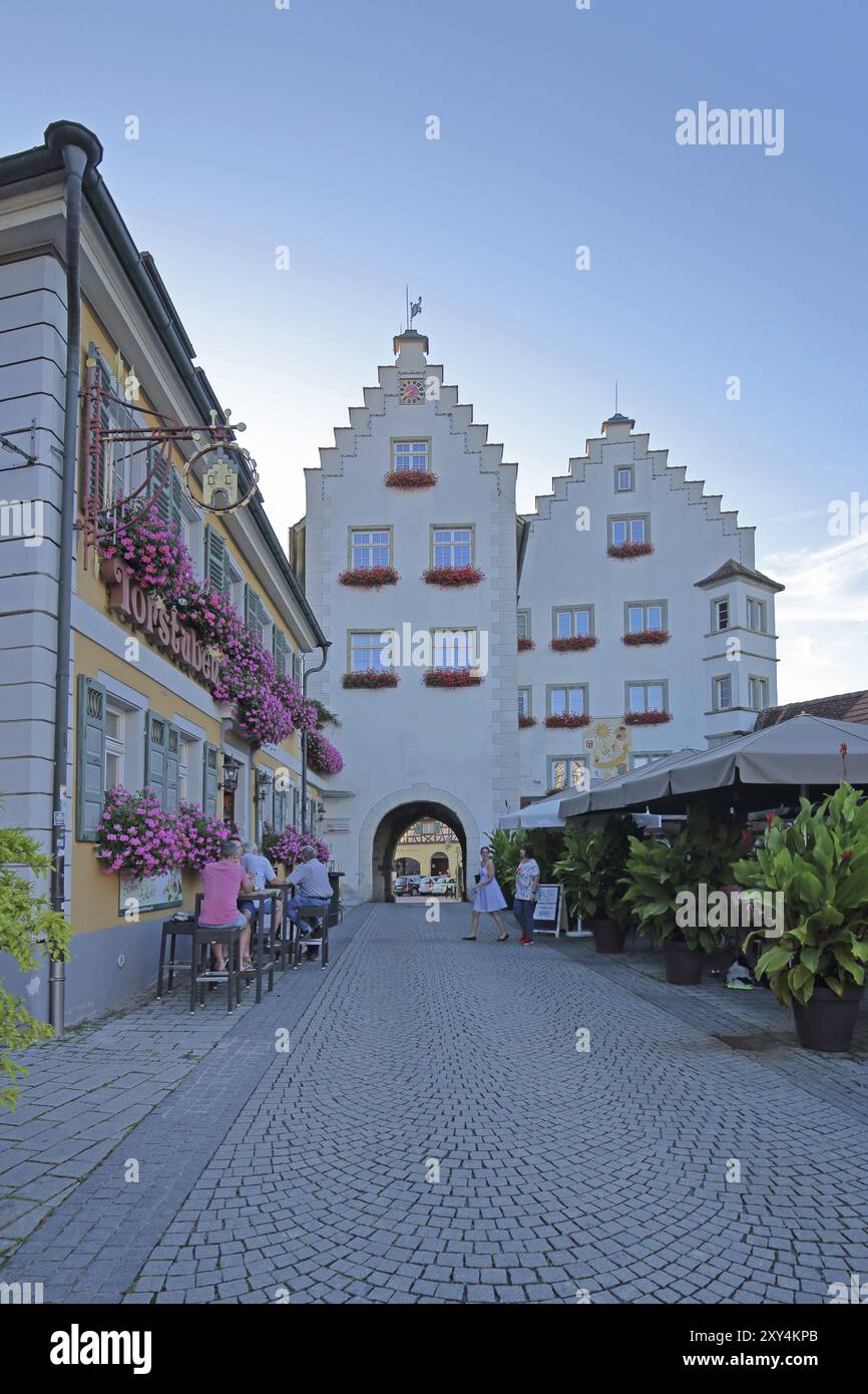Historic gate castle with stepped gable and street pub, town gate, town ...