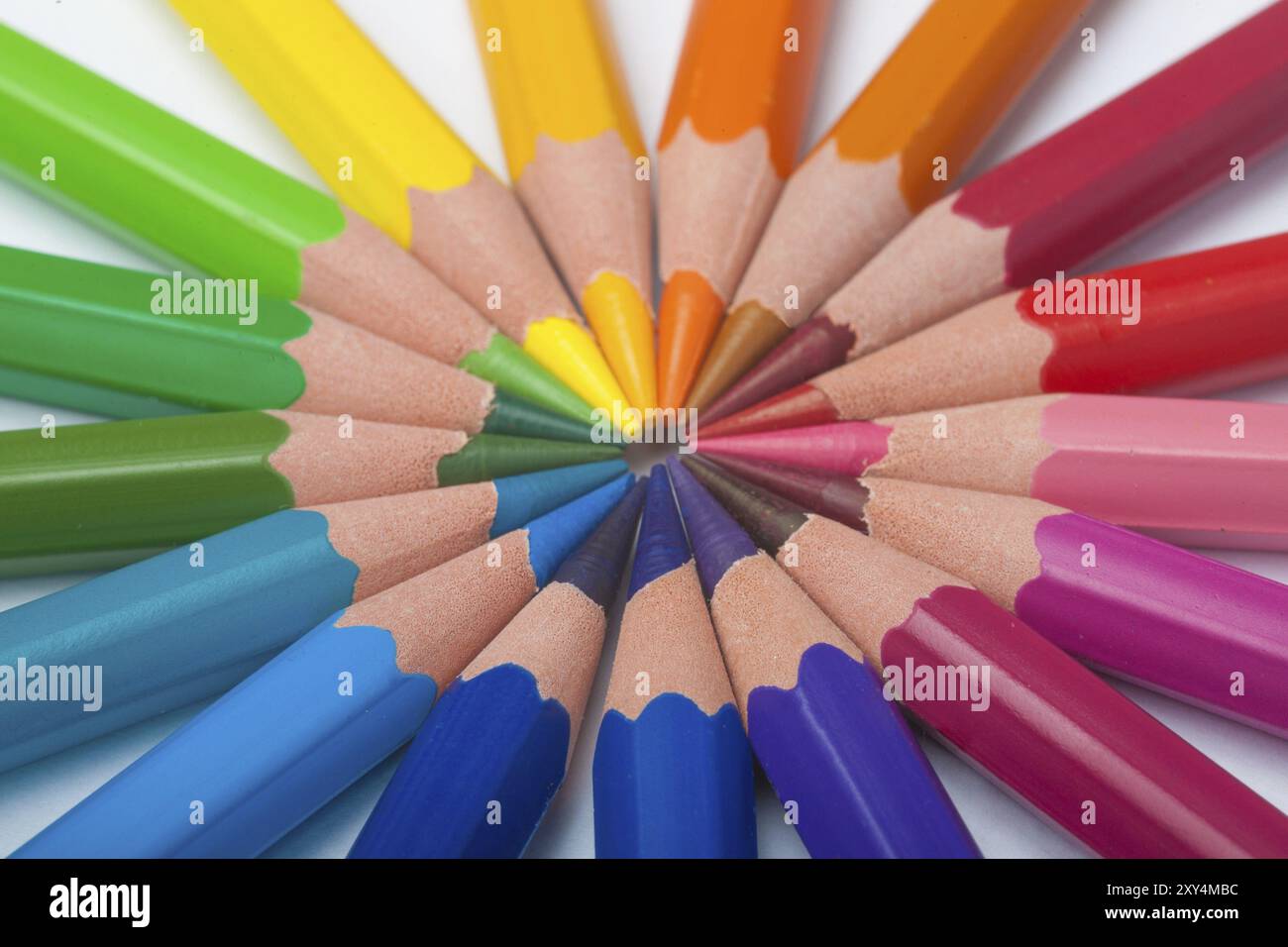 Pencils in arrange in color wheel on white background Stock Photo - Alamy