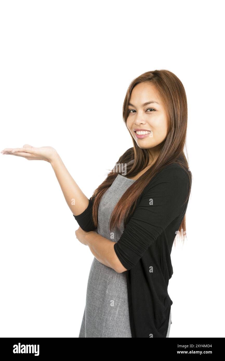 Side profile of gorgeous Asian woman wearing gray dress, black sweater ...