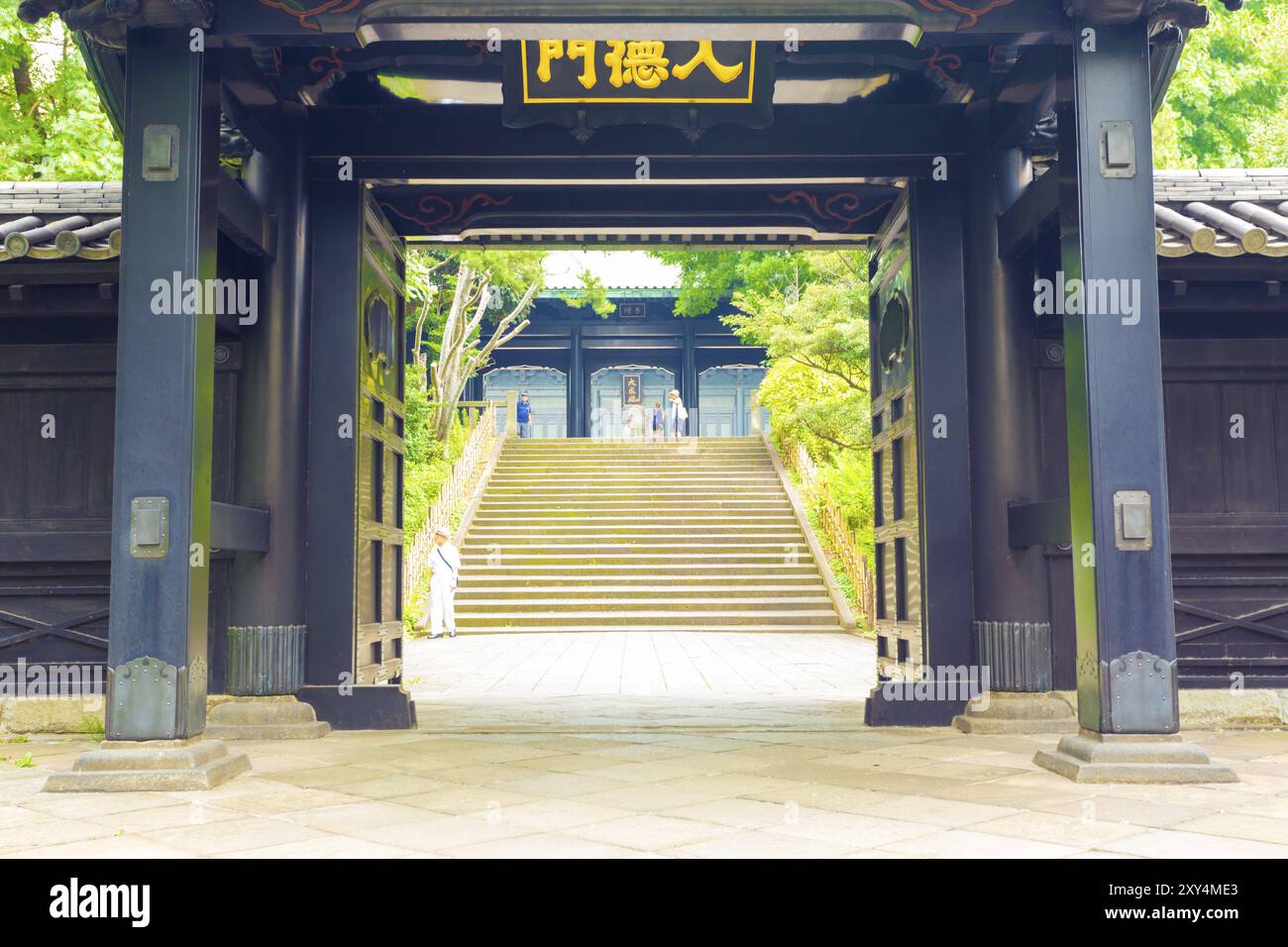 Stairs seen through open entrance doorway to historic Yushima Seido, a ...
