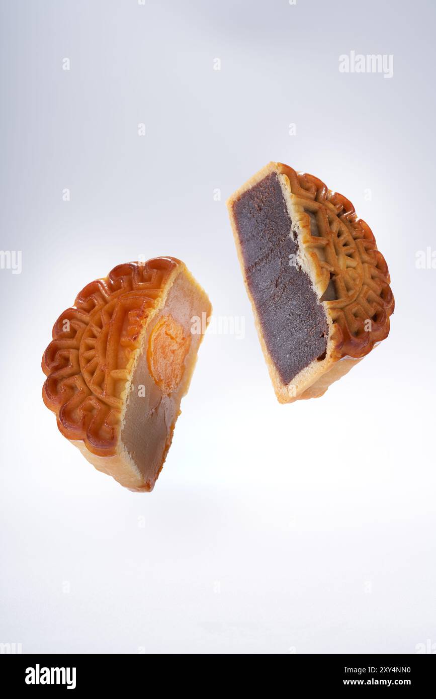 Traditional Cantonese style egg yolk lotus seed paste mooncake for Mid ...