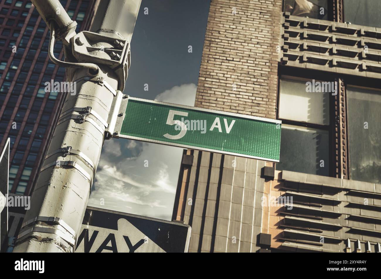 Green Fifth Ave 5th Ave, New York City sign, view from low angle with ...