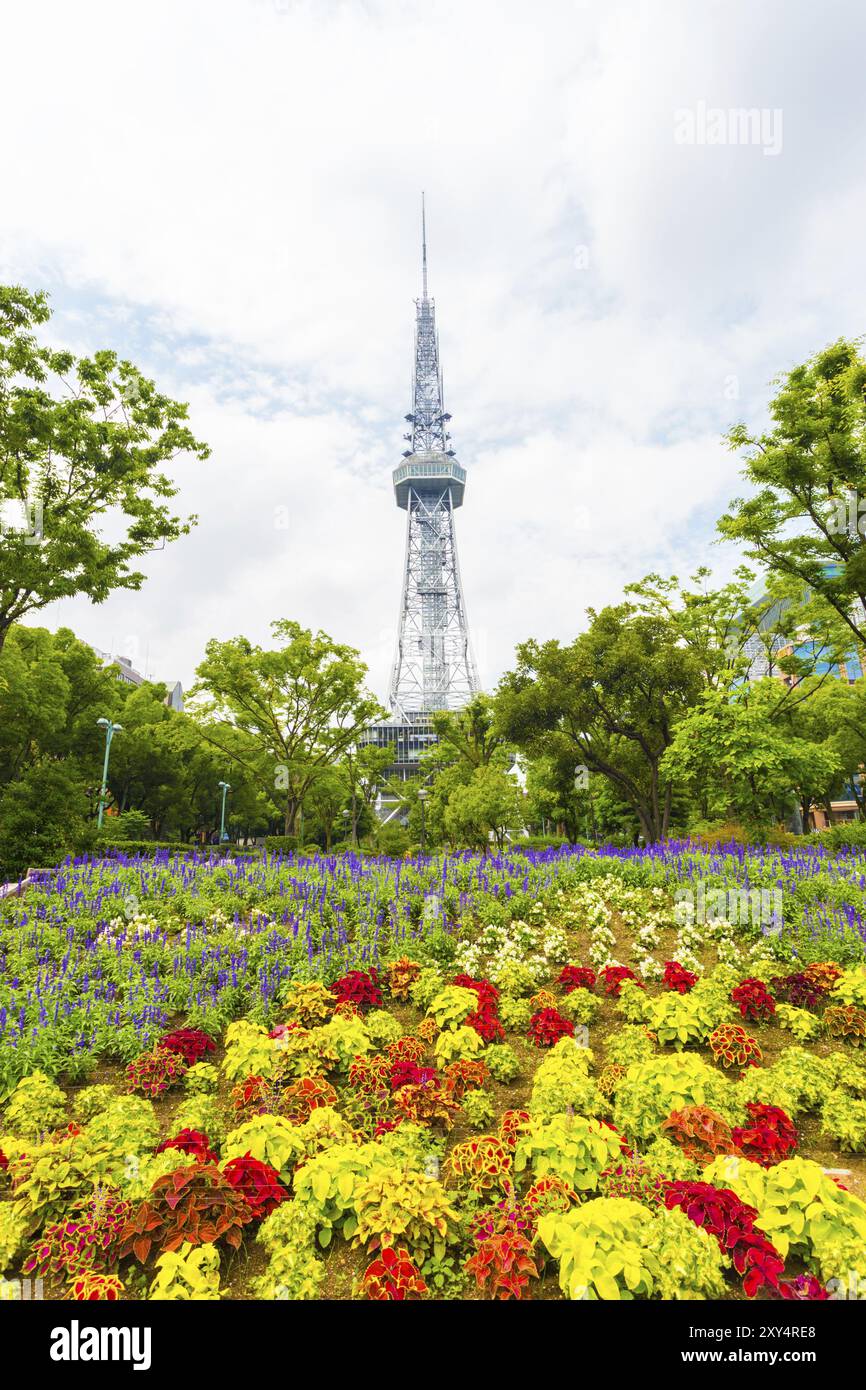 Nagoya TV Tower in background of a colorful flower garden at Hisaya ...