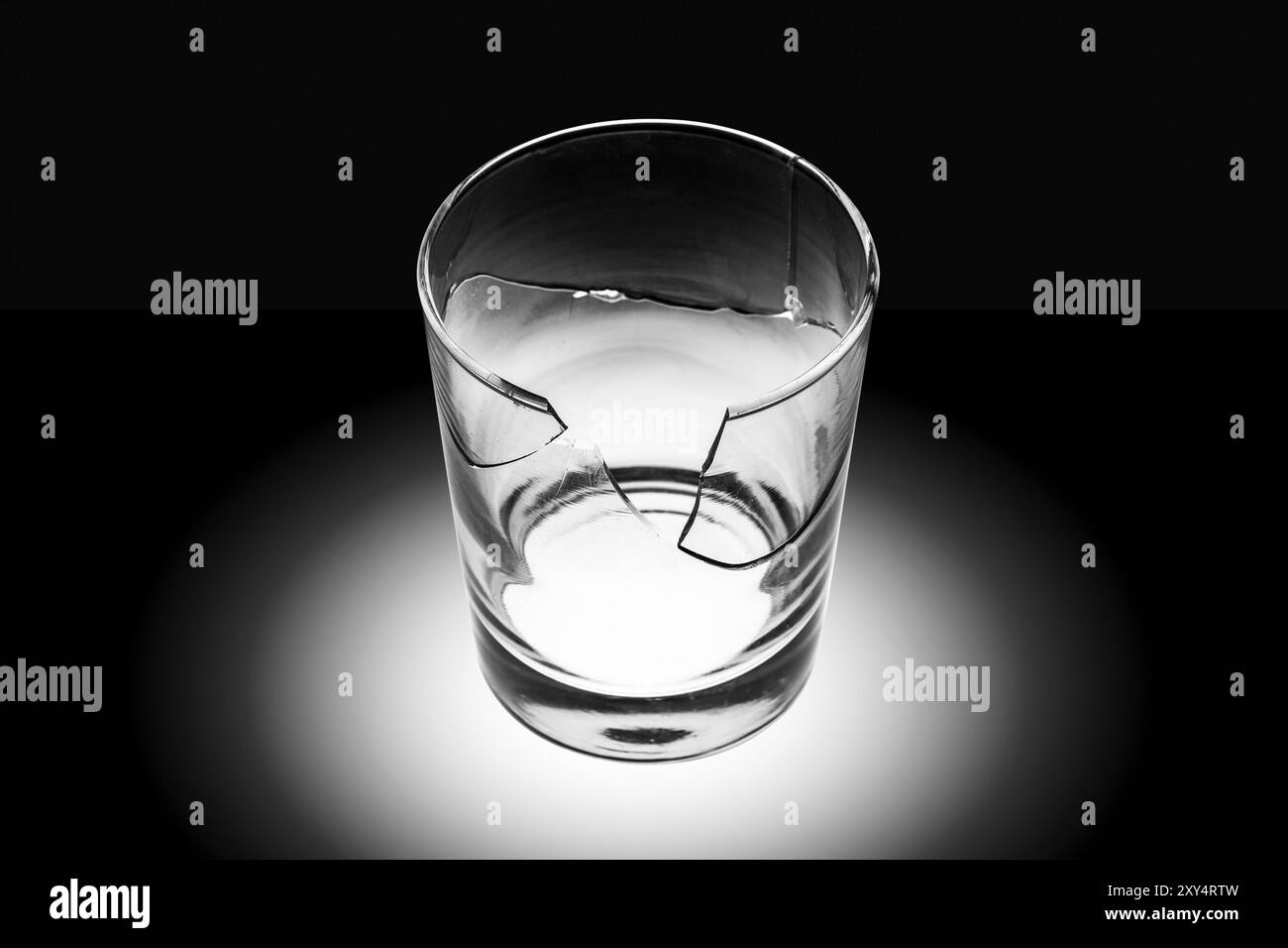 Fallen broken glass on black background. Damage concept Stock Photo - Alamy
