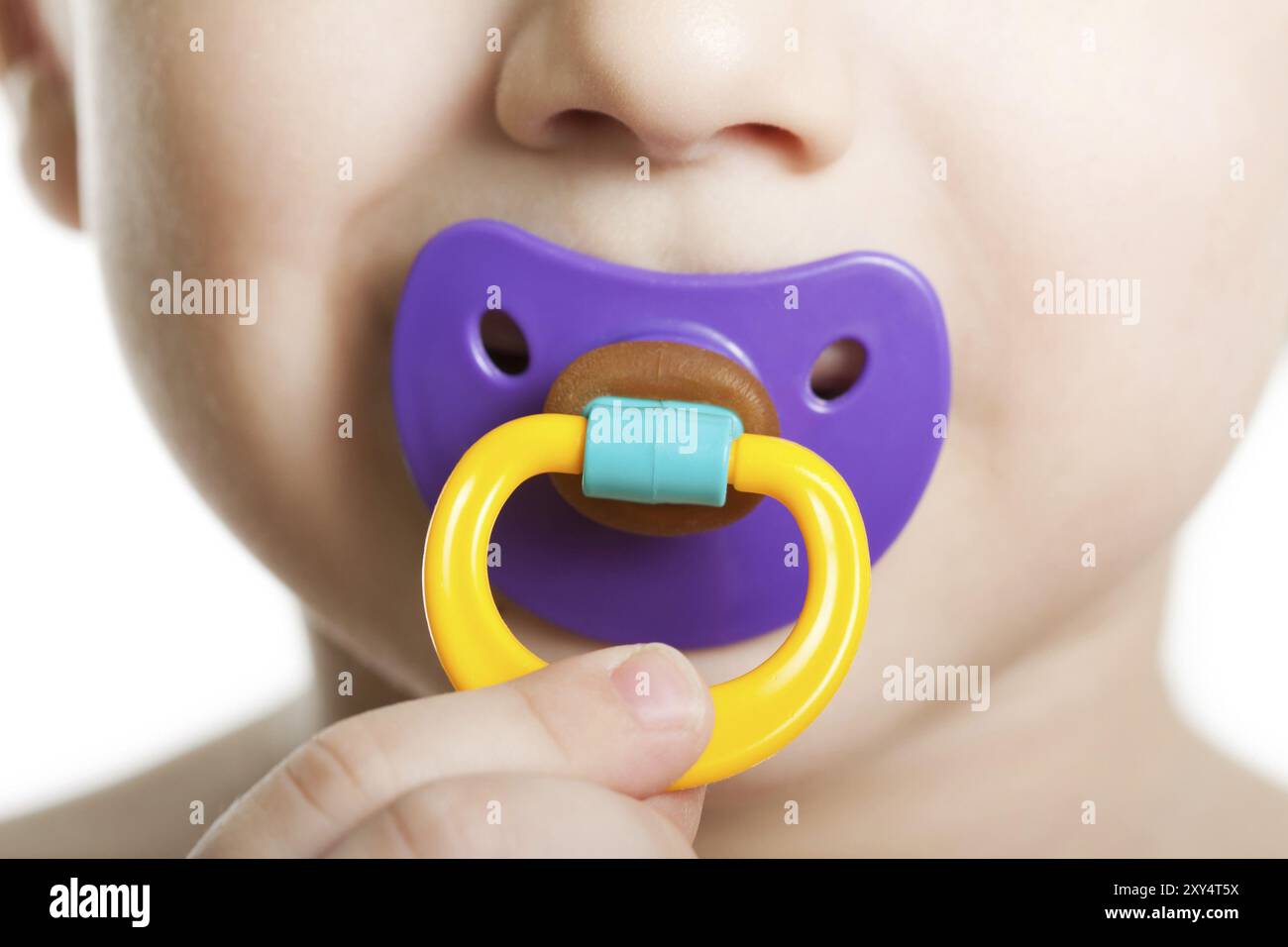 Little child boy and plastic baby soother pacifier Stock Photo - Alamy
