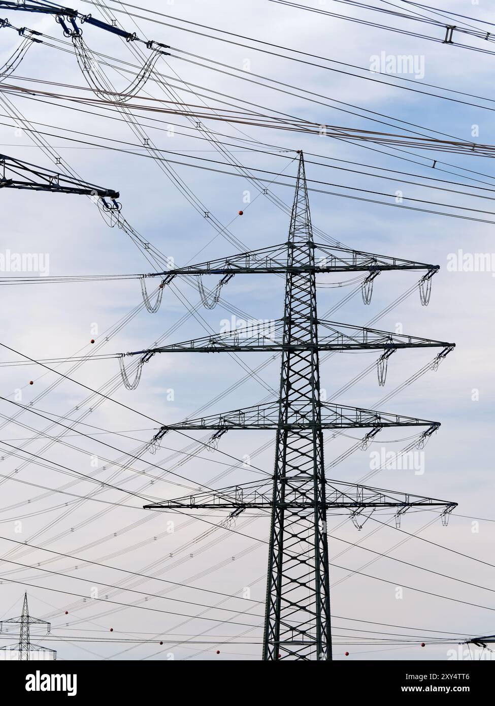 High-voltage pylons near a substation Stock Photo - Alamy