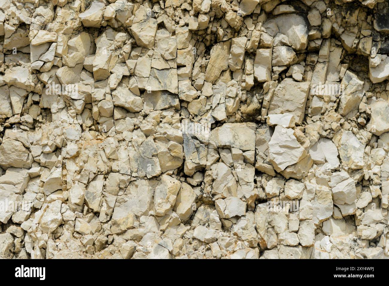 Textured stone background Rubble ballast in natural form in the rock ...
