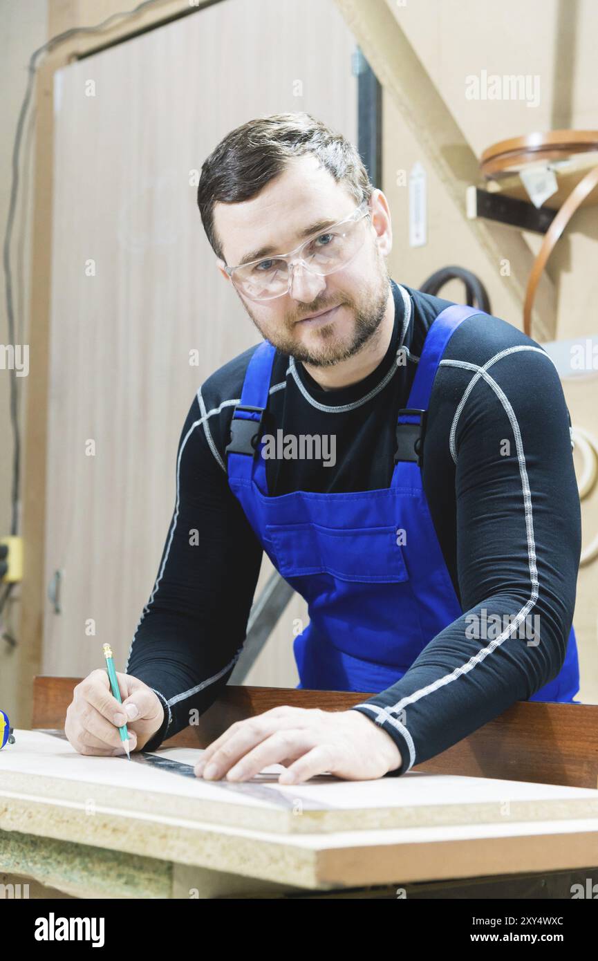 Bearded tired handsome carpenter hi-res stock photography and images ...