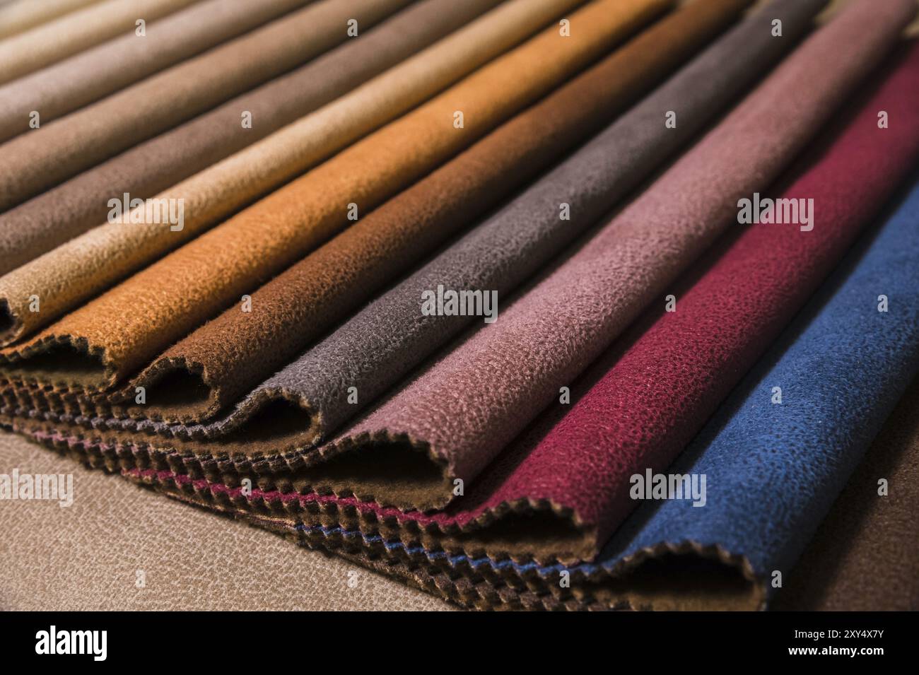 Colorful and bright fabric samples of furniture and clothing upholstery ...