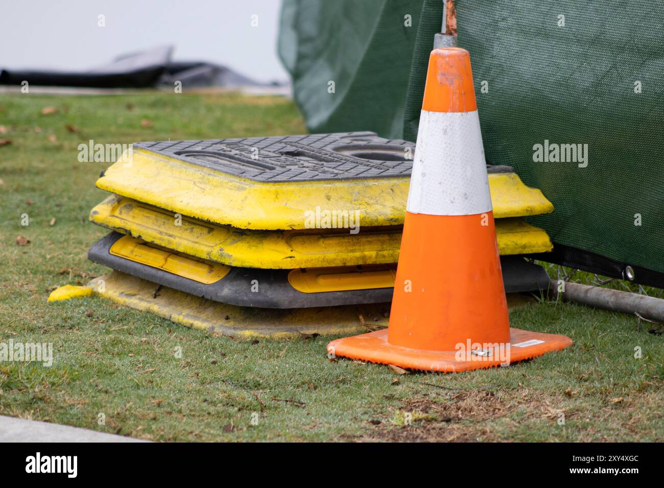 white and orange traffic cone at construction site Stock Photo - Alamy
