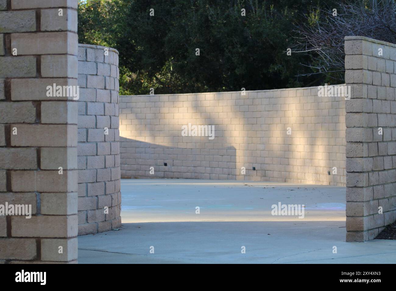 curved brick wall in garden Stock Photo - Alamy