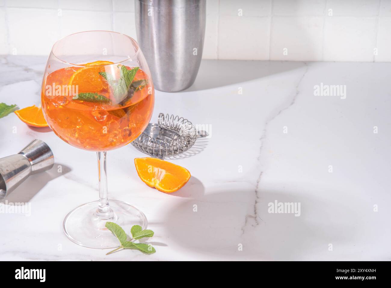 Classic italian aperitif aperol spritz cocktail in glass with ice cubes ...