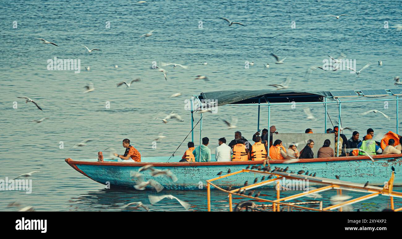 Varanasi, India. Tourists And Indian Pilgrims Floating On Ganga ...