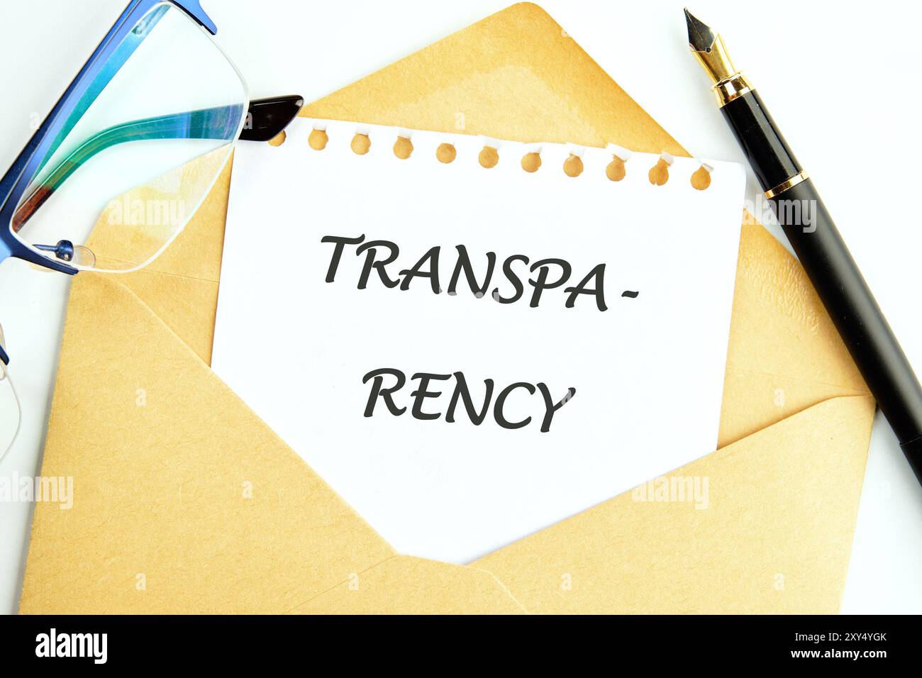 TRANSPARENCY word alphabet letters on a white sheet of notepad sticking ...