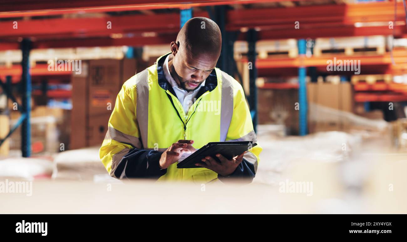 Logistics, black man and tablet in warehouse for checklist, inventory ...