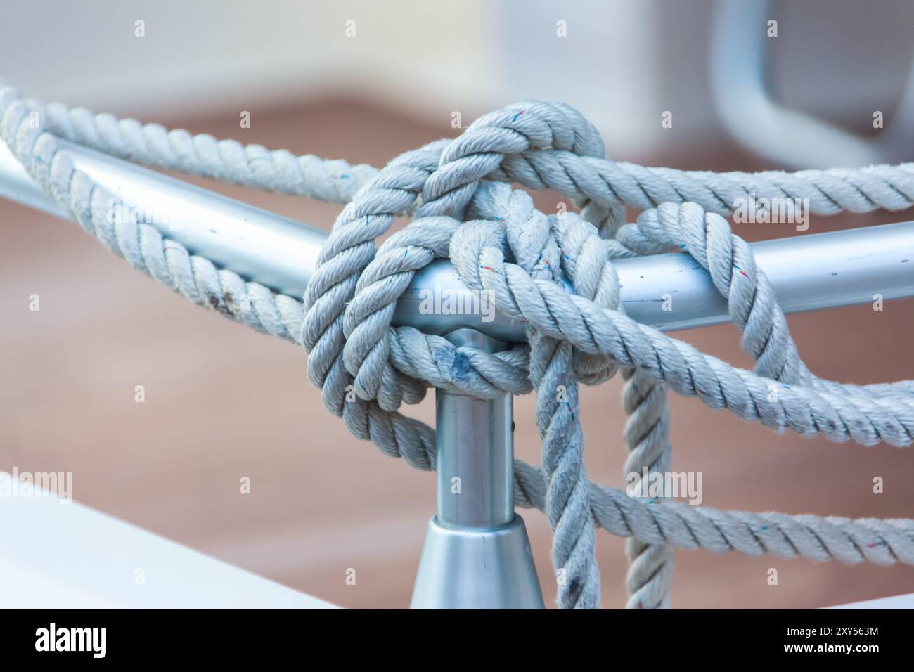 Yachting - Mooring rope tied around steel anchor Stock Photo - Alamy