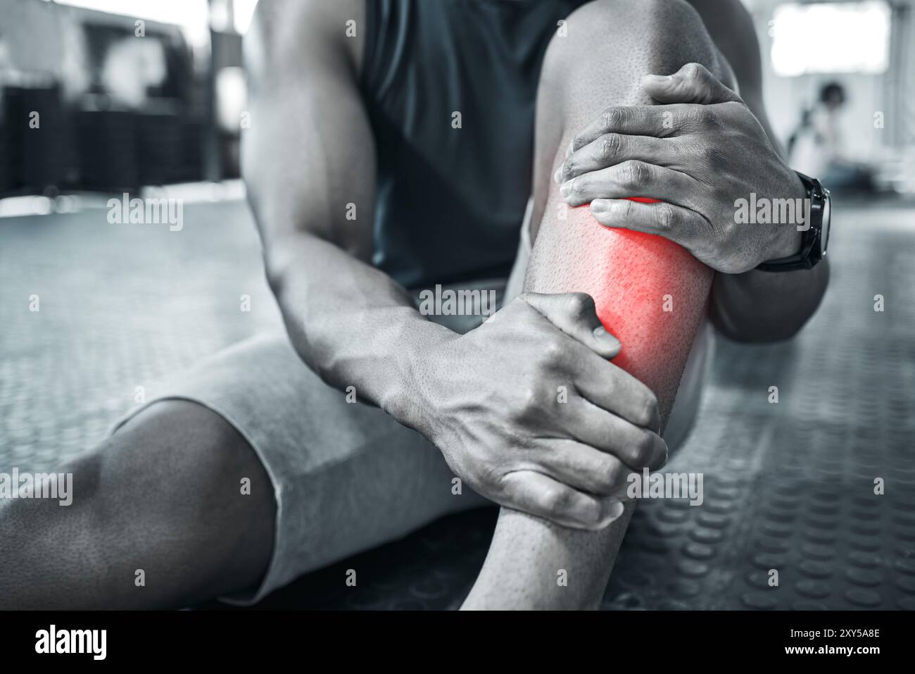 Fitness, injury and leg pain with person on floor of gym for accident ...