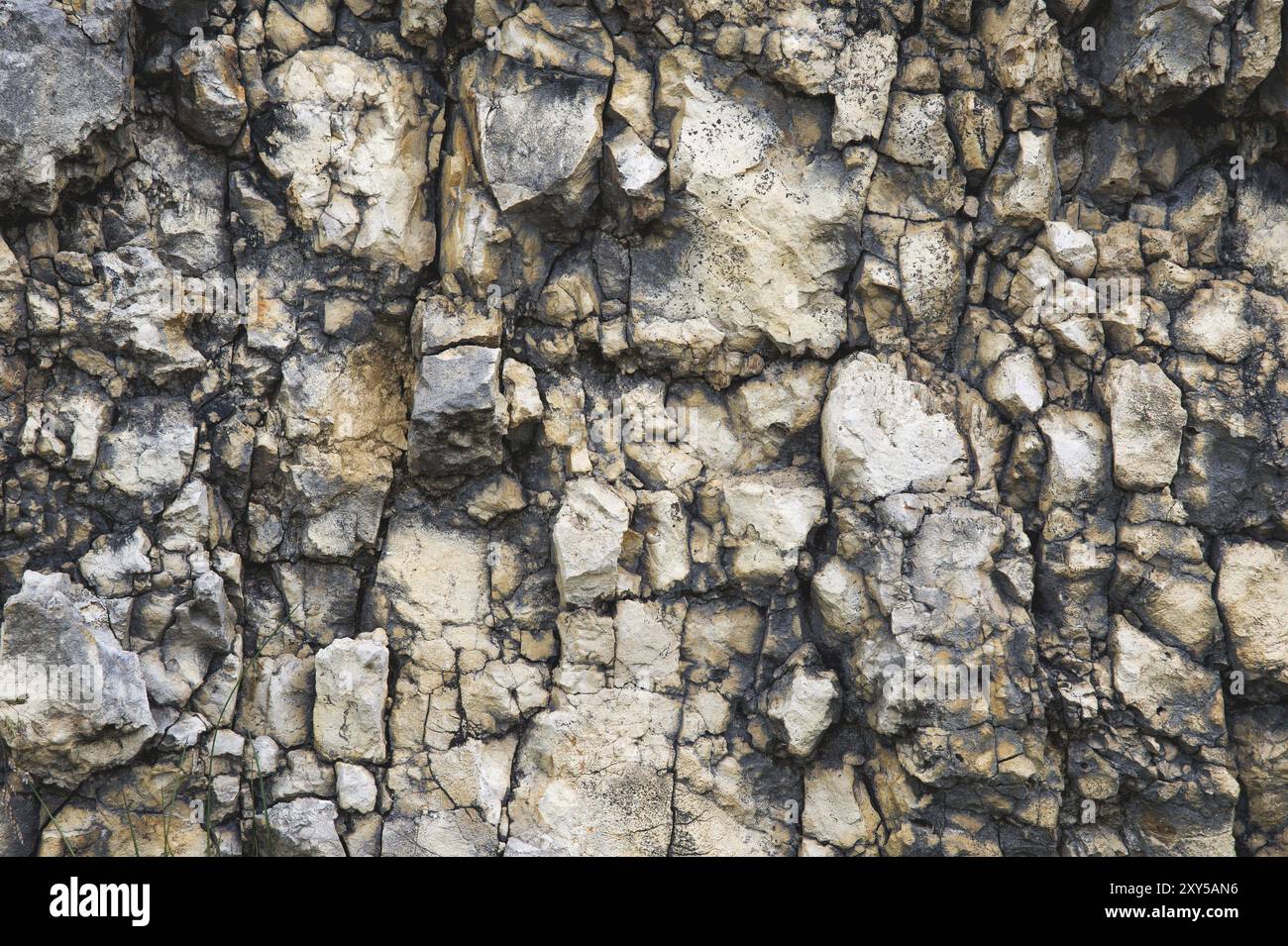 Textured stone background Rubble ballast in natural form in the rock ...
