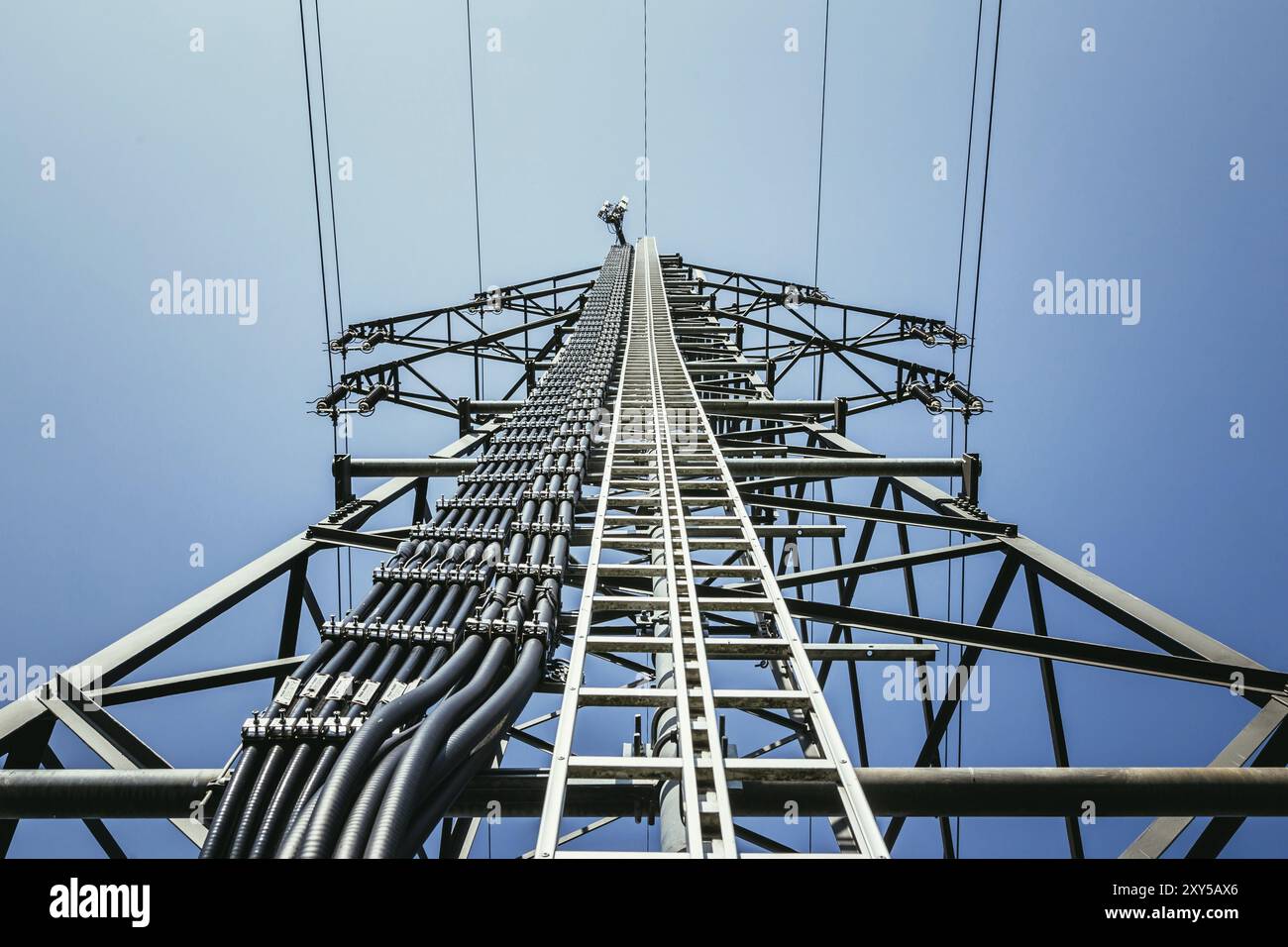 Picture of an electrical tower or pylon, blue sky in the background ...