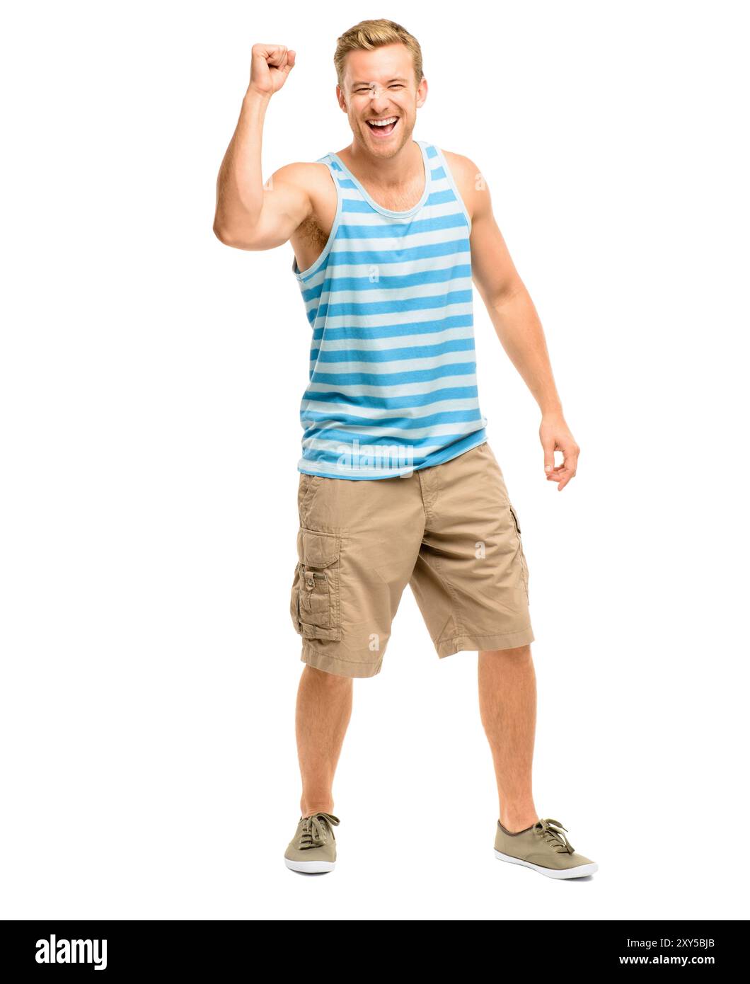 Man, portrait and celebration in studio for success with giveaway ...