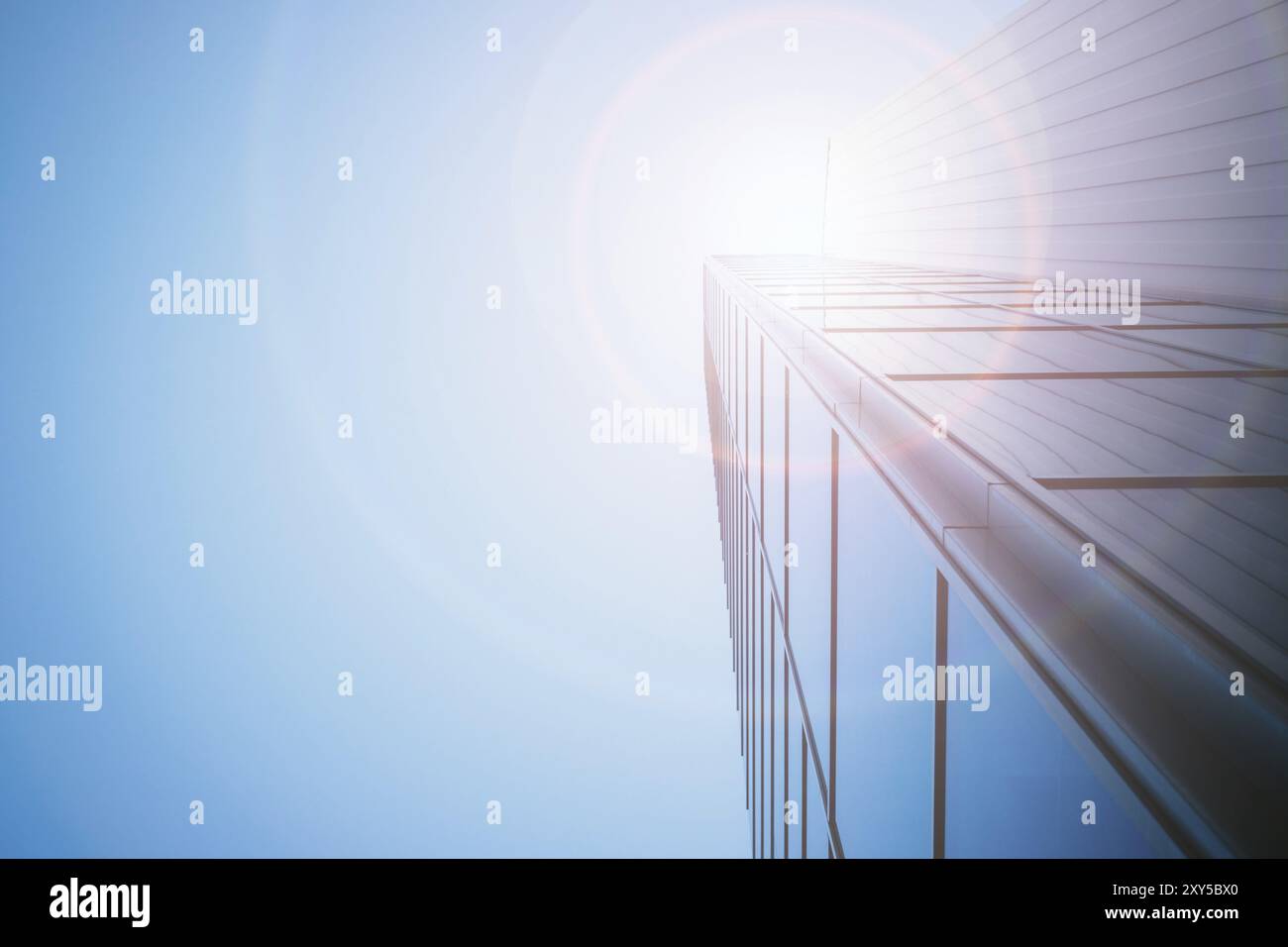Modern skyscraper out of glass, blue sky and sunbeam Stock Photo - Alamy