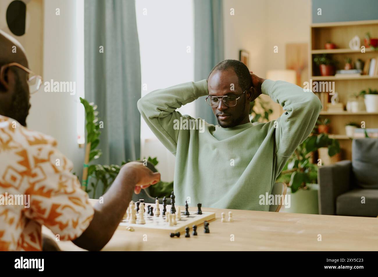 Man watching friend moving hi-res stock photography and images - Alamy