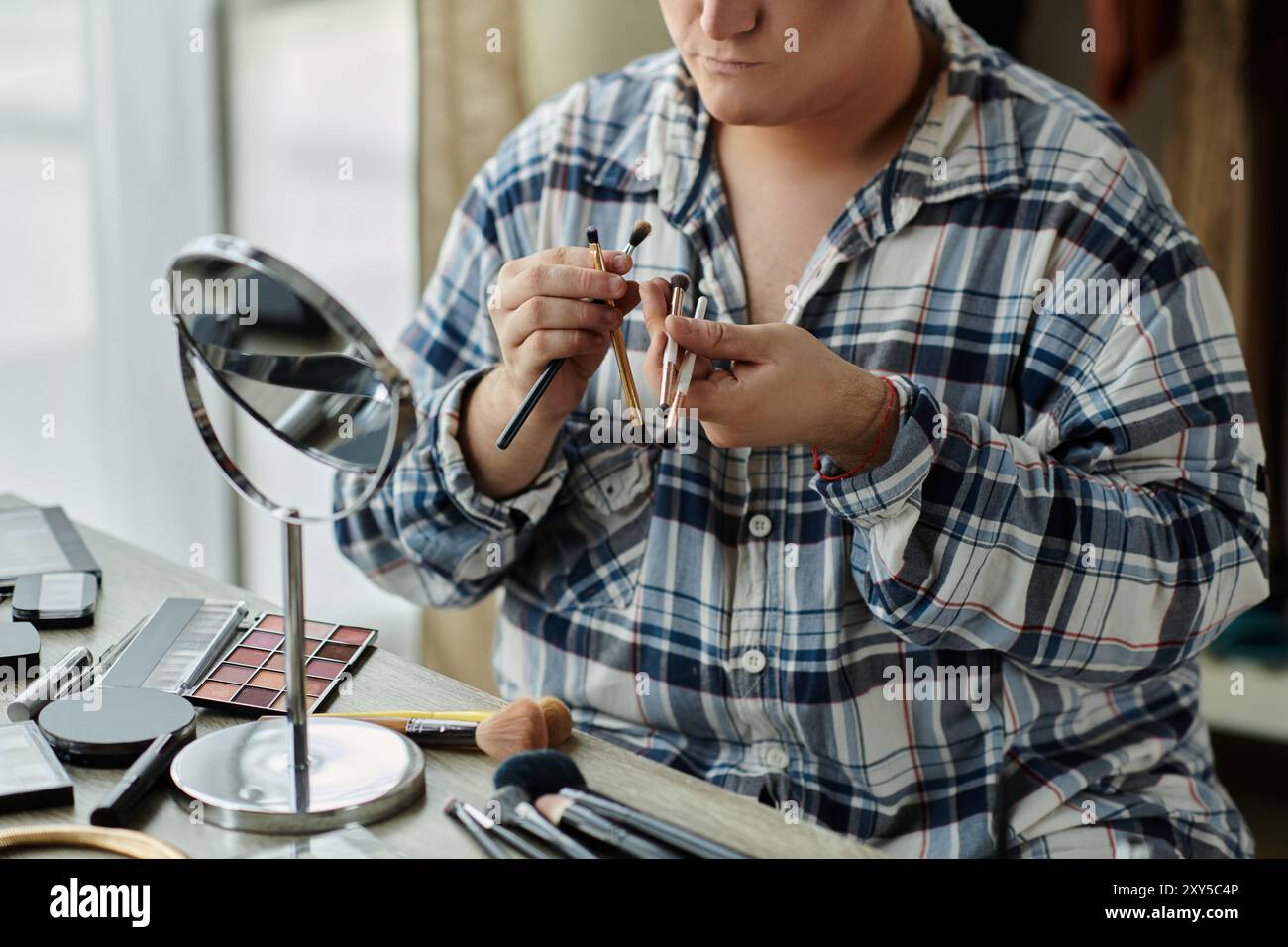 Non binary makeup artist hi-res stock photography and images - Alamy