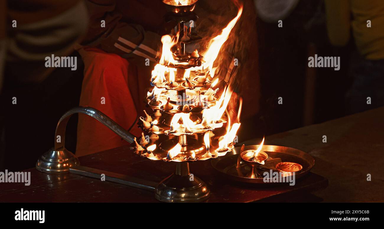 Varanasi, Uttar Pradesh, India. Candle Holder With Lit Candles On Ganga ...