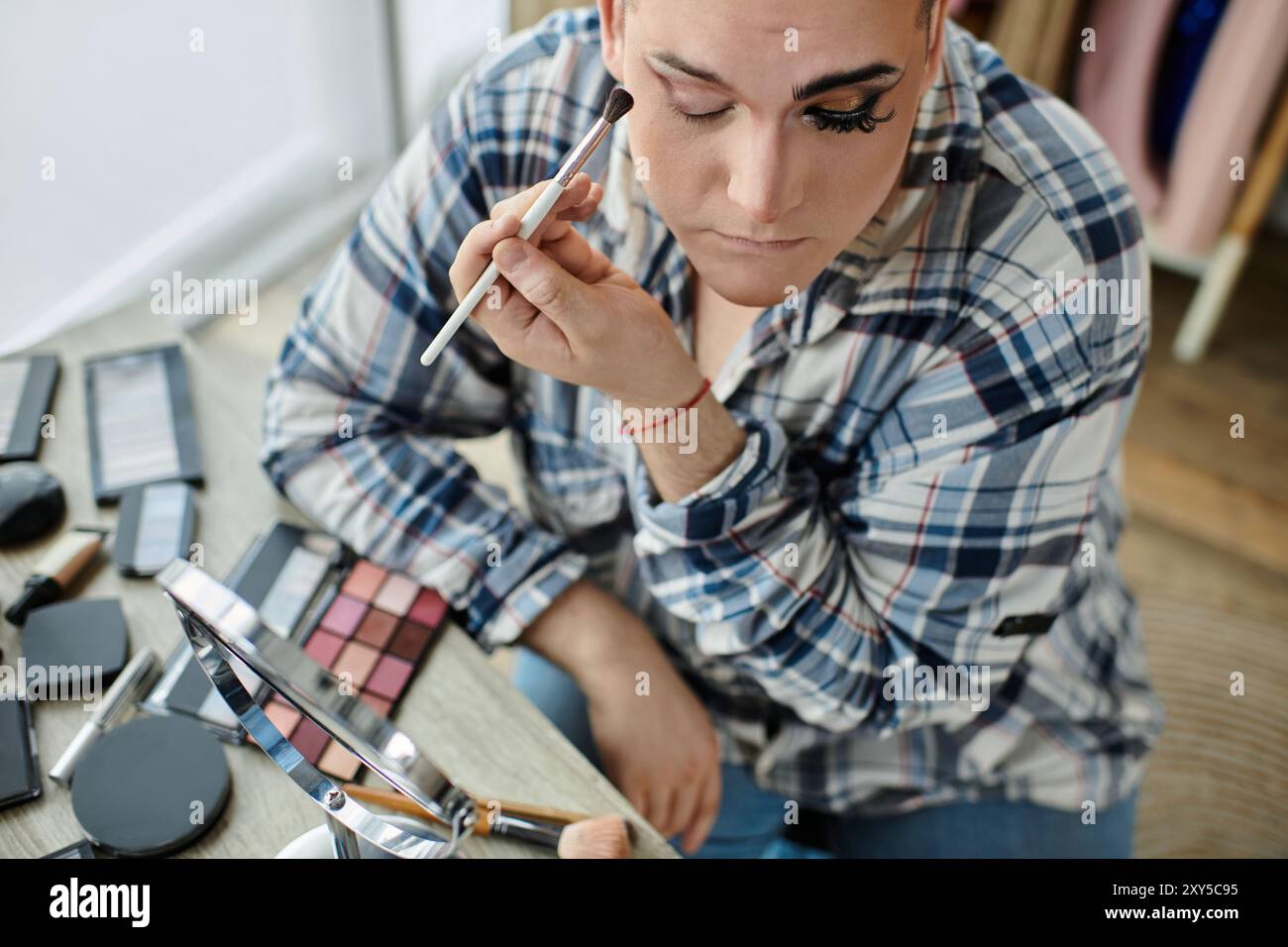 Person in plaid shirt hi-res stock photography and images - Alamy