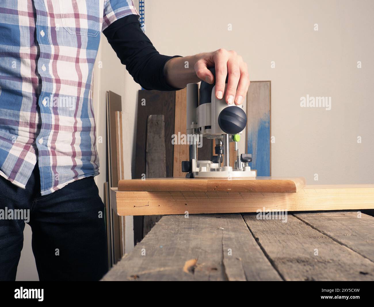 Wood working concept image with an upper mill on a rustic workbench ...