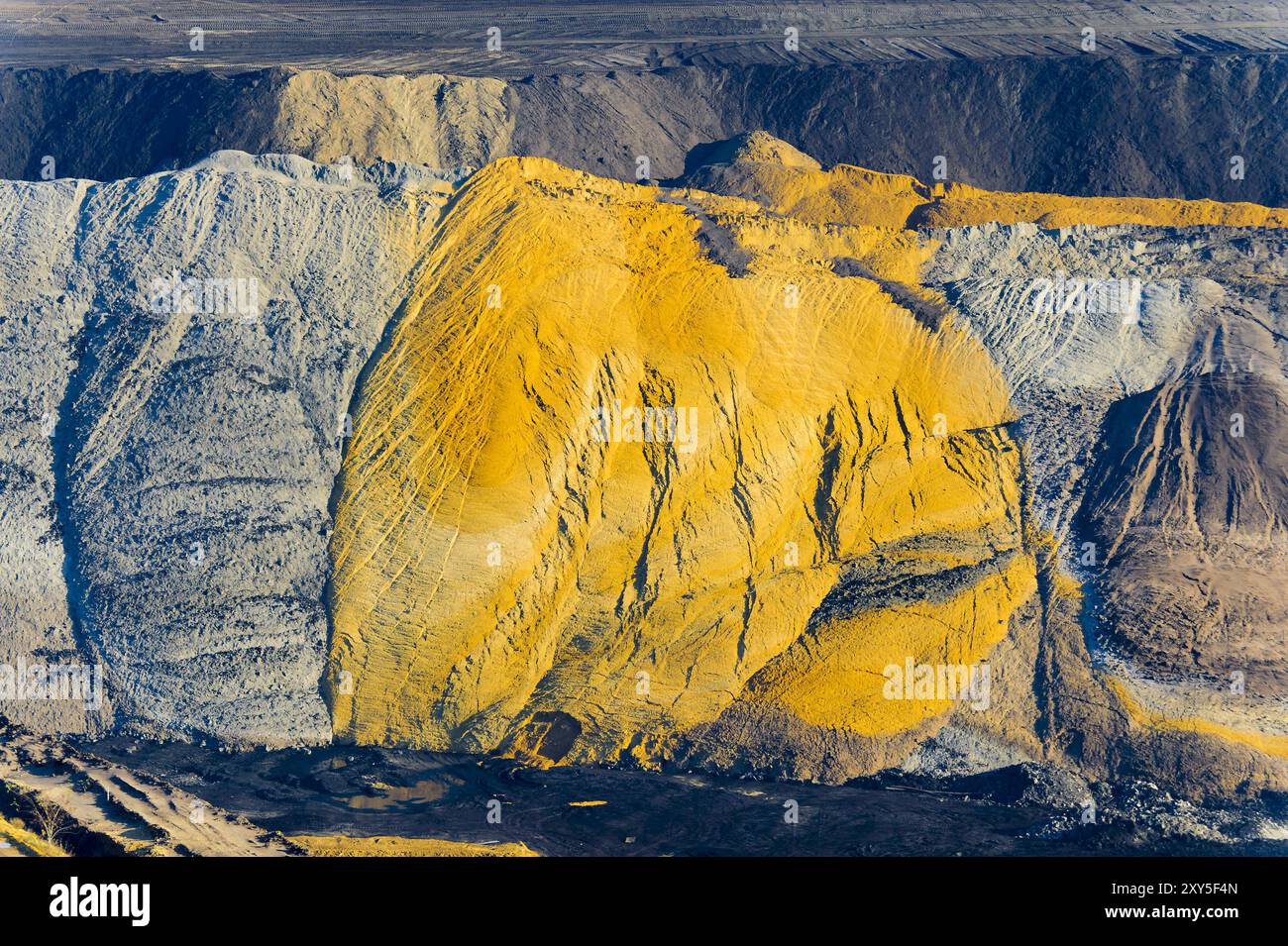 Earth formations in a backfilled open-cast mine Stock Photo - Alamy
