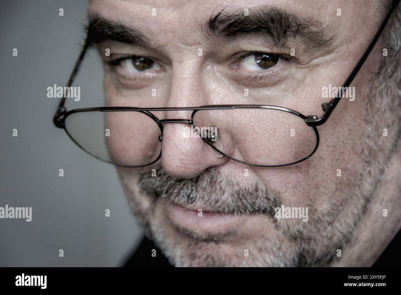 Portrait of a cheerful senior citizen Stock Photo - Alamy