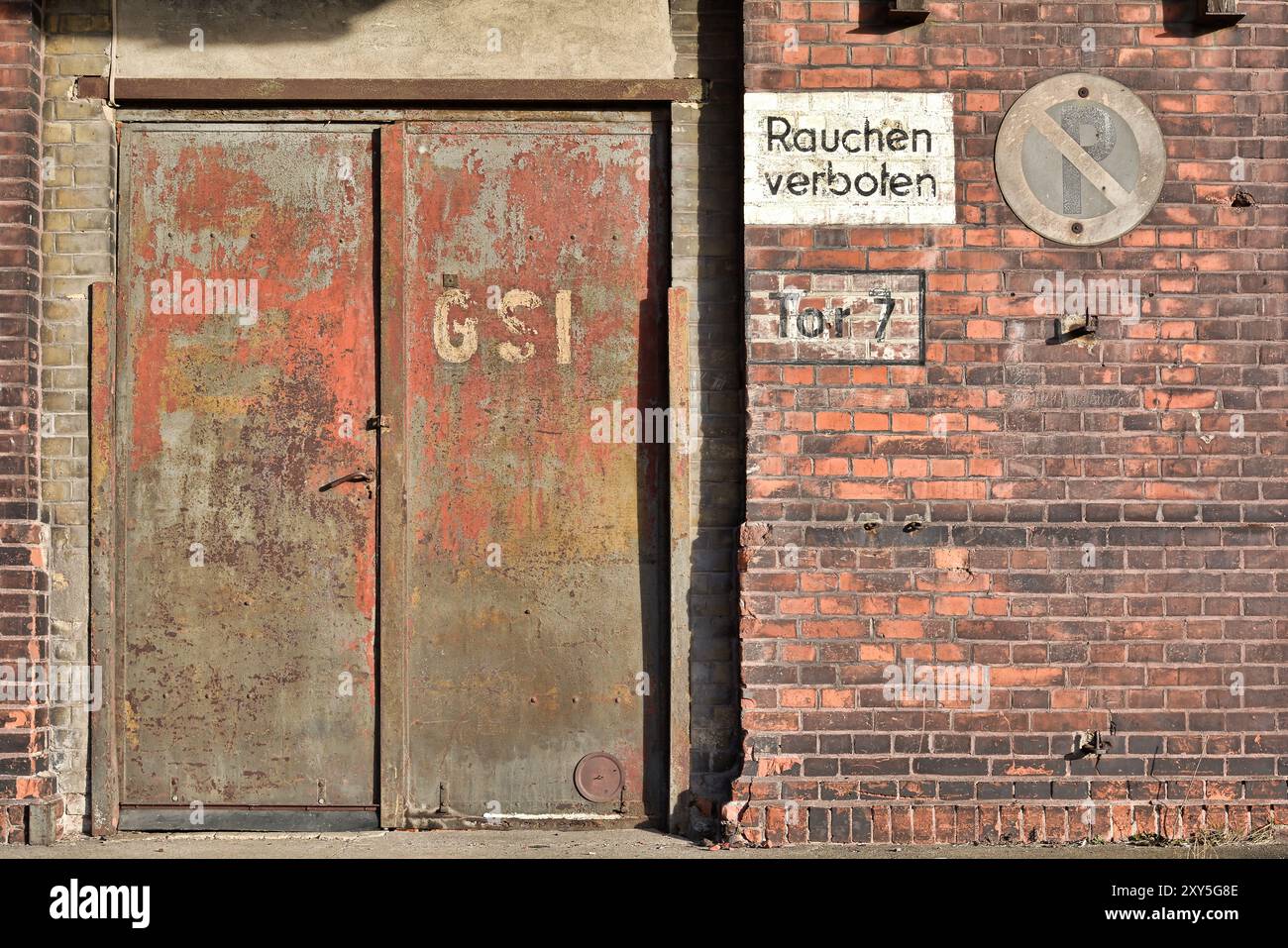 Old rusty door on an abandoned industrial building in Magdeburg Stock ...