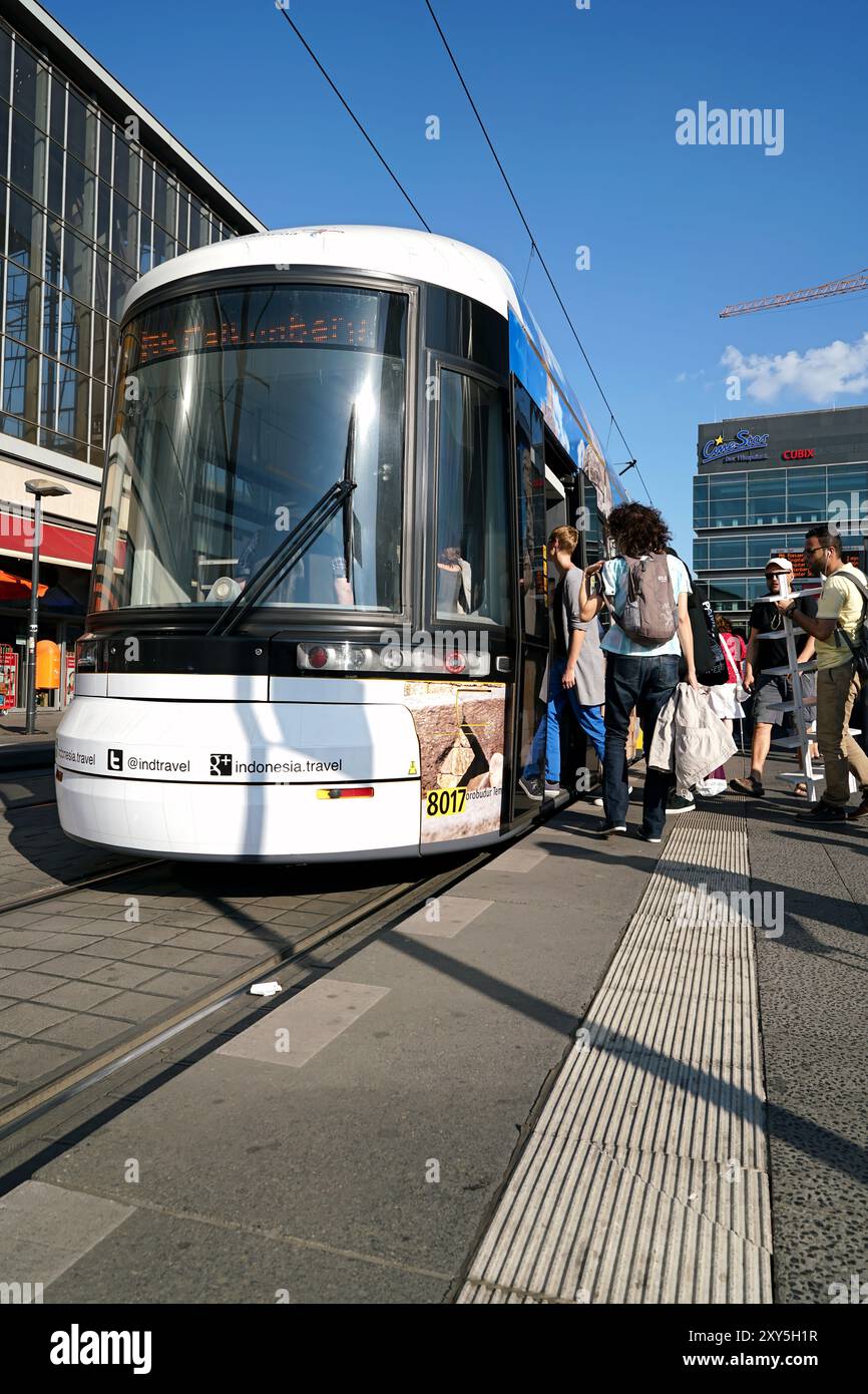 Passengers board on tram hi-res stock photography and images - Alamy
