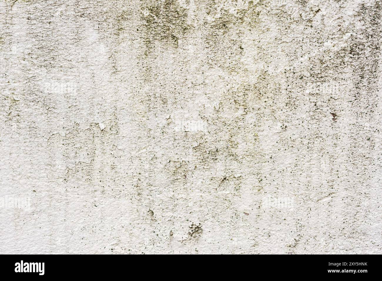 Textured background of a tiled wall with traces of moisture in the form ...