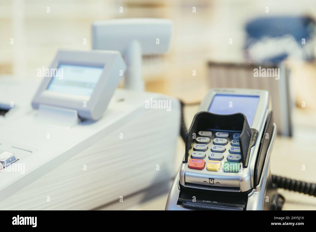 Cash register in a shop: Customer is paying purchase Stock Photo - Alamy