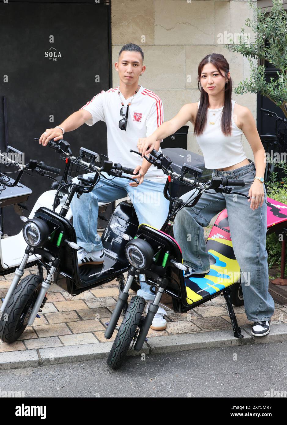 Tokyo, Japan. 28th Aug, 2024. Models display Japanese mobility venture ...