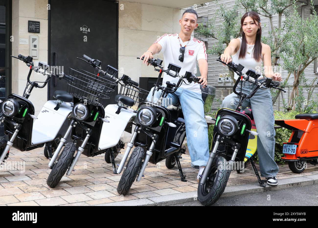 Tokyo, Japan. 28th Aug, 2024. Models display Japanese mobility venture ...