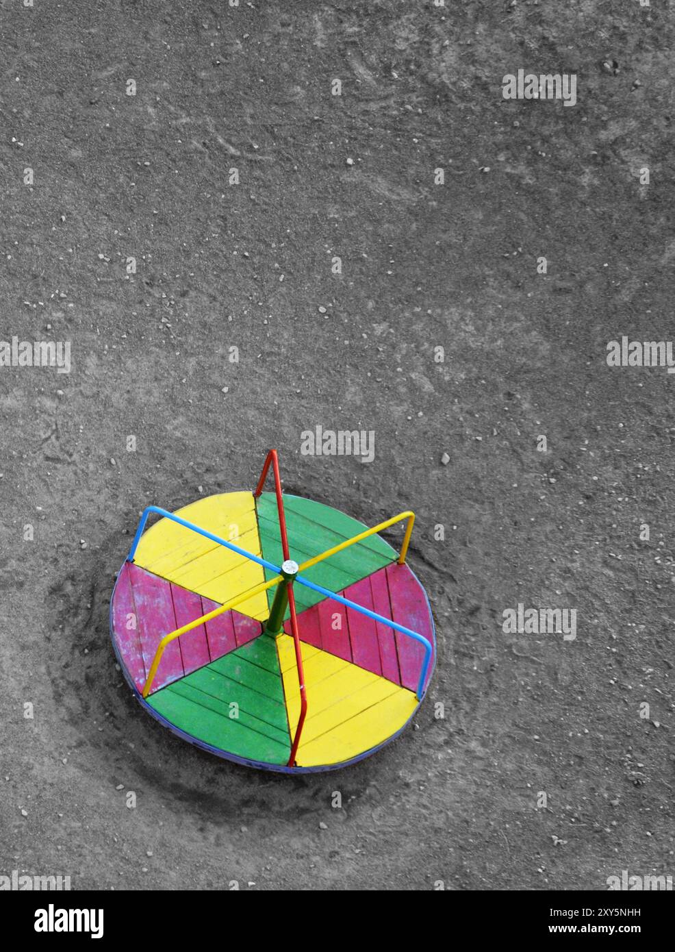 Empty roundabout at a children playground, aerial view with copyspace ...