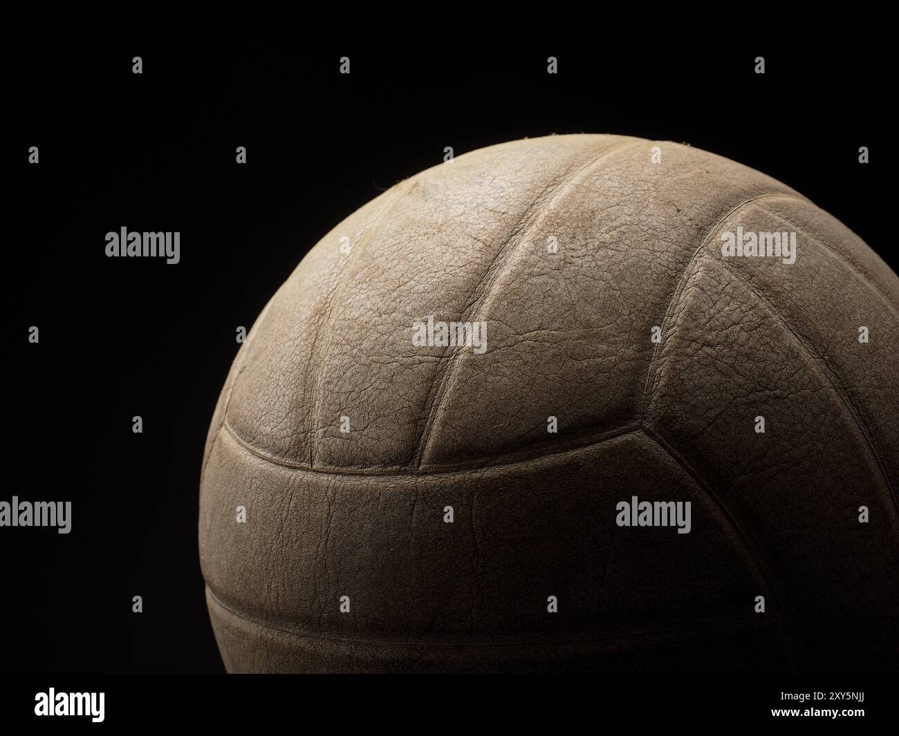 Old used vintage volleyball on a dark background Stock Photo - Alamy