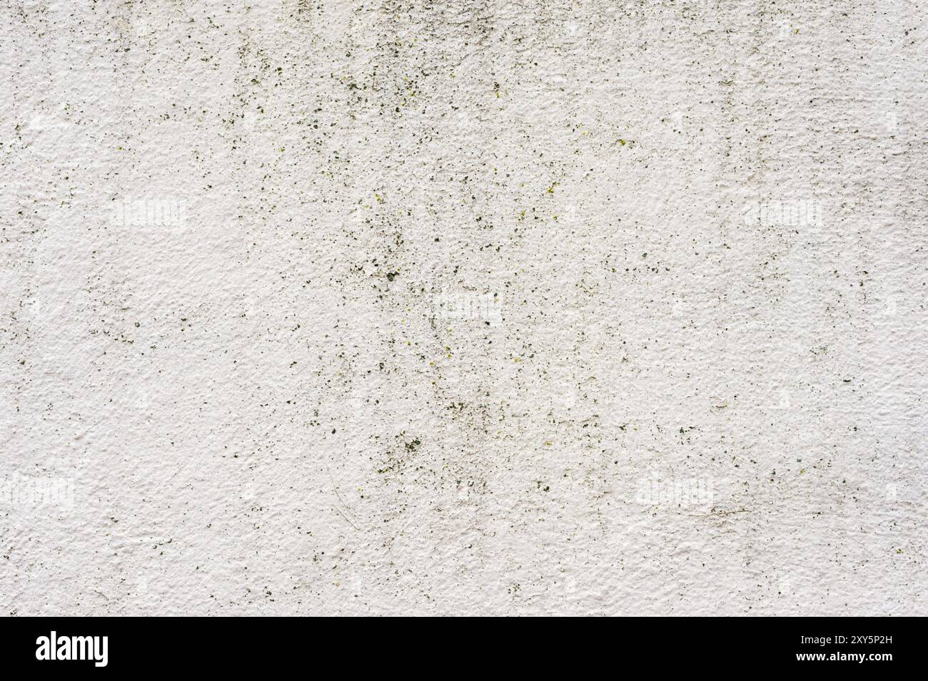 Textured background of a tiled wall with traces of moisture in the form ...