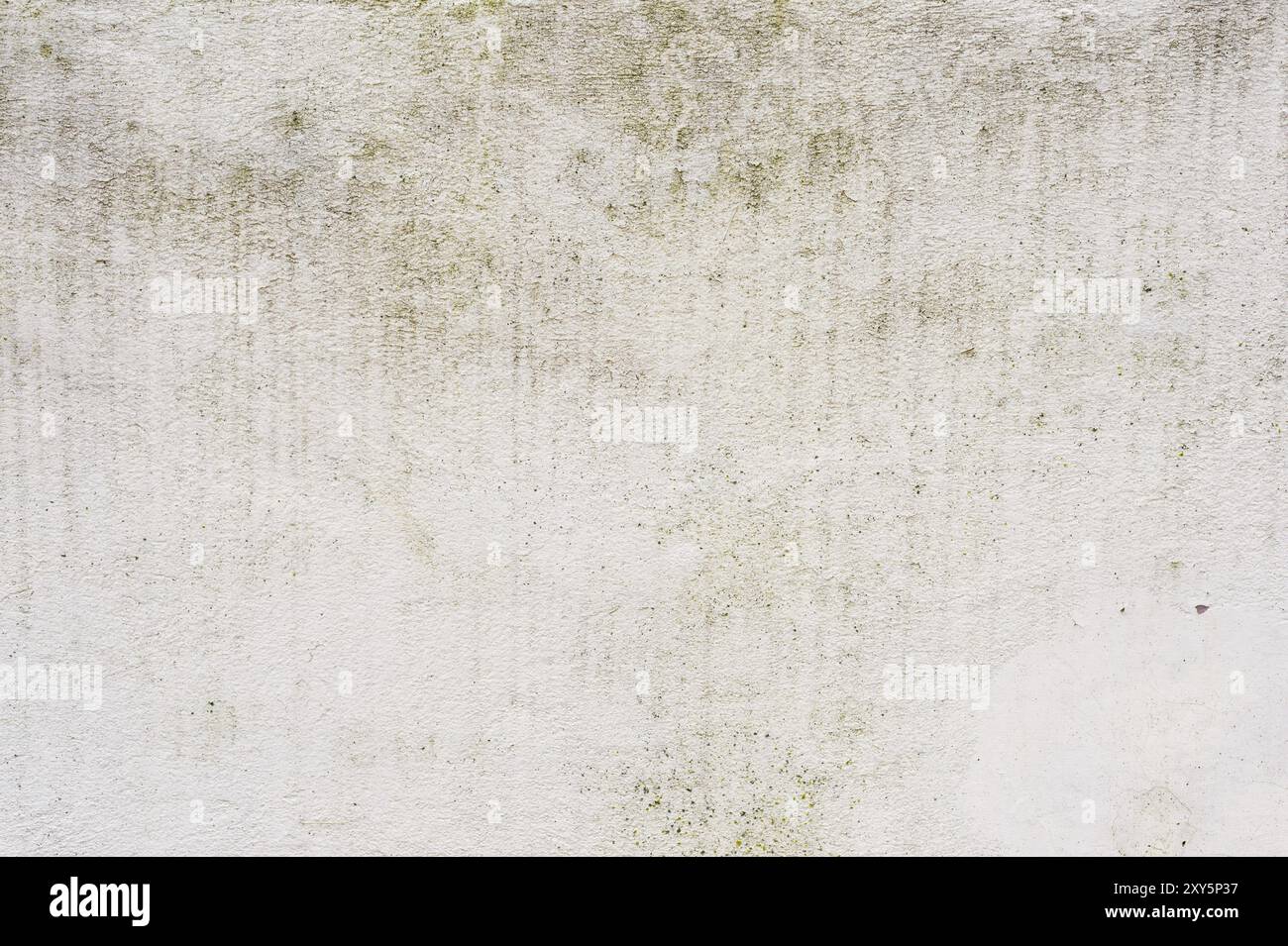 Textured background of a tiled wall with traces of moisture in the form ...