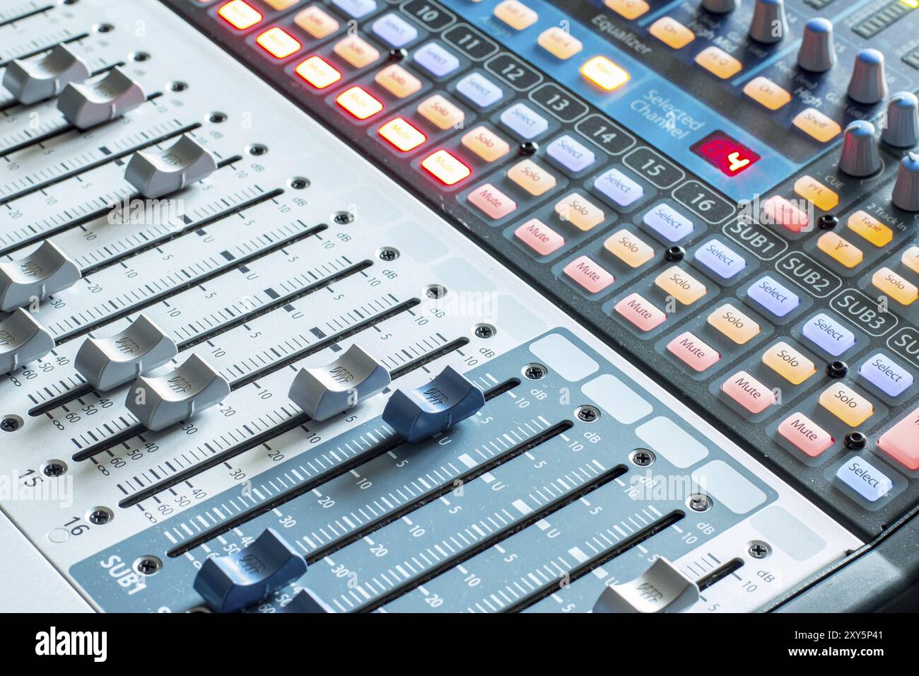 Professional music production in a sound recording studio, mixer desk ...