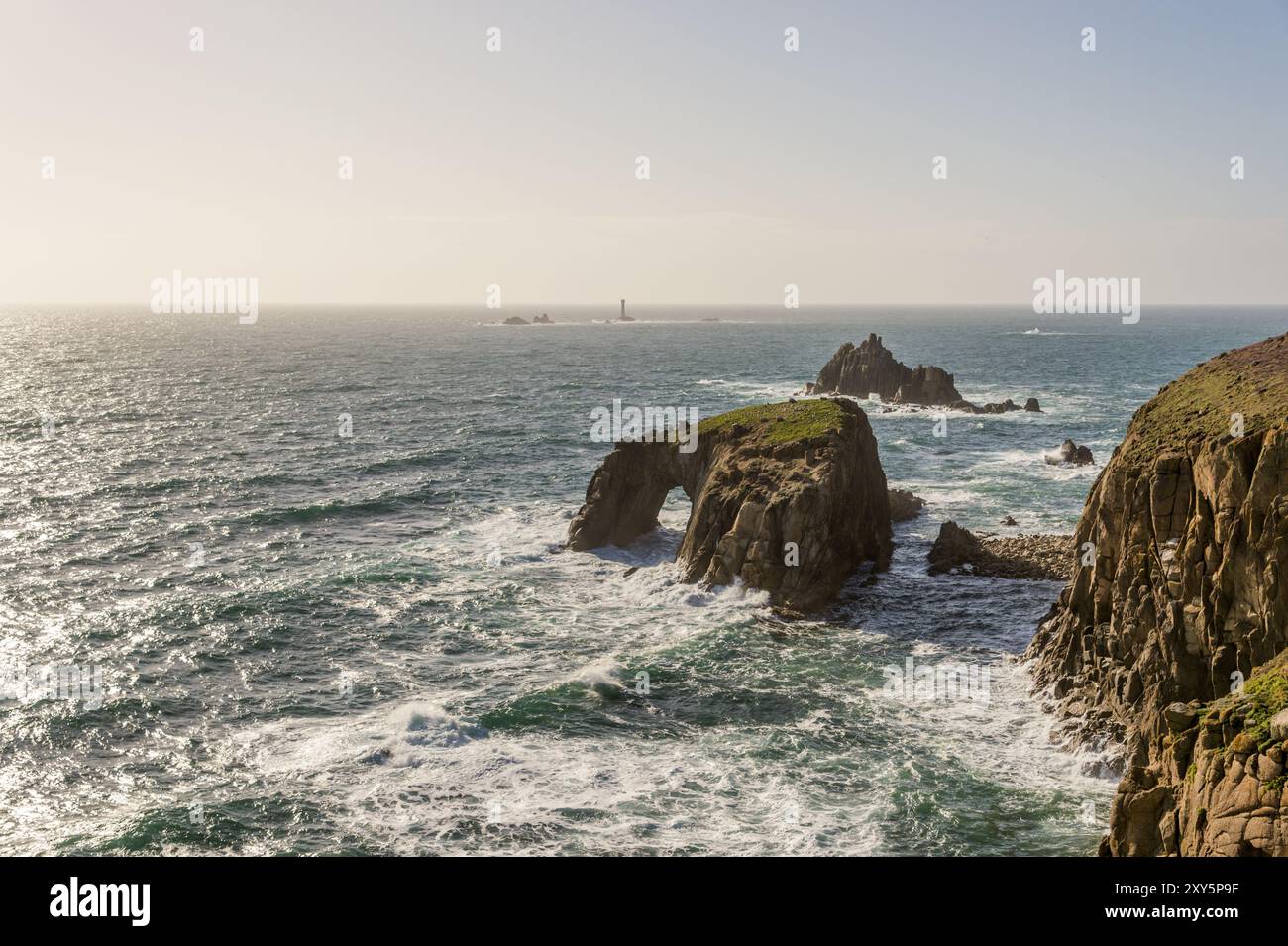 Rock gate and Armed Knight in front of the cliffs Stock Photo - Alamy