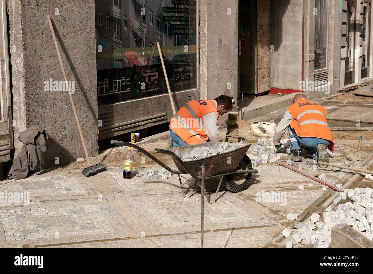 Construction workers renew a foot Stock Photo - Alamy