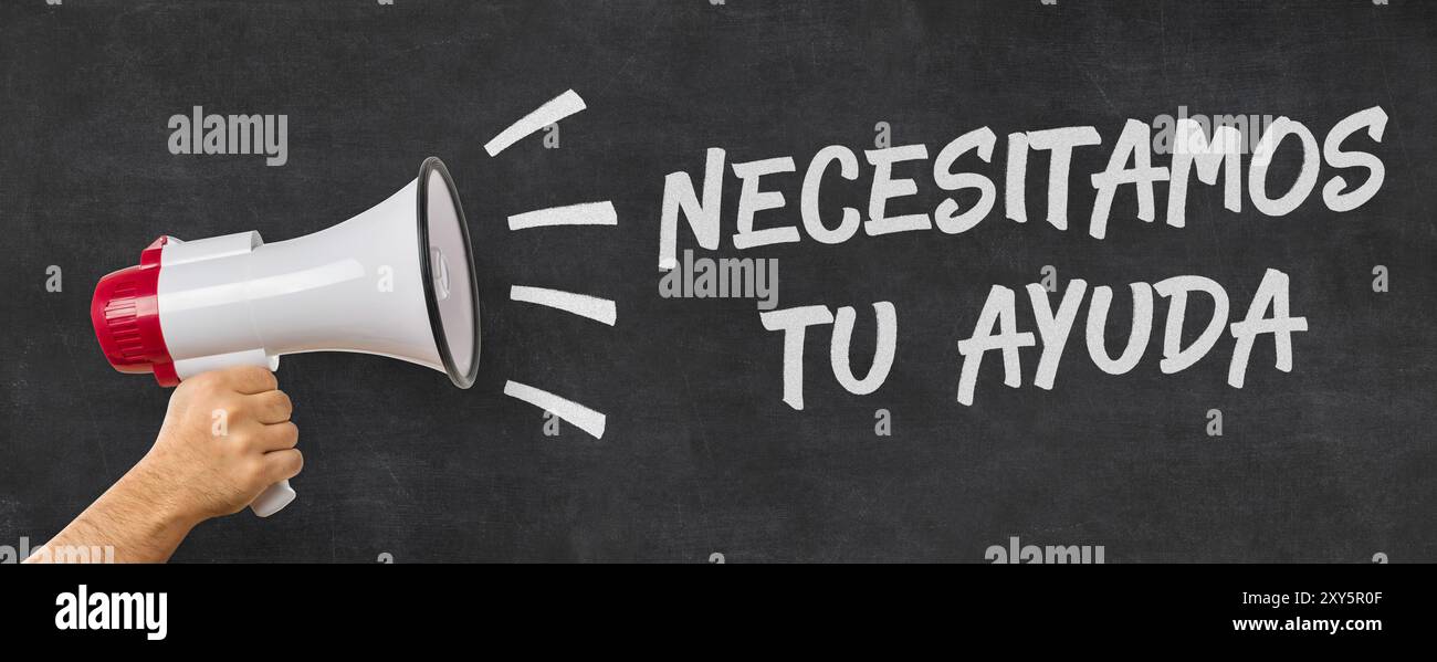 A man holding a megaphone - We need your help in spanish Stock Photo ...
