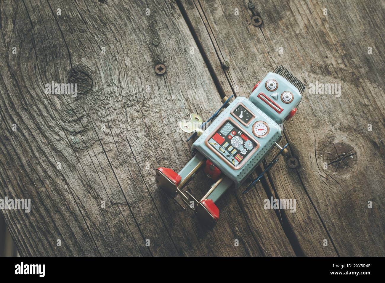 Robot toy, symbol for a chatbot or social bot and algorithms. Wood ...